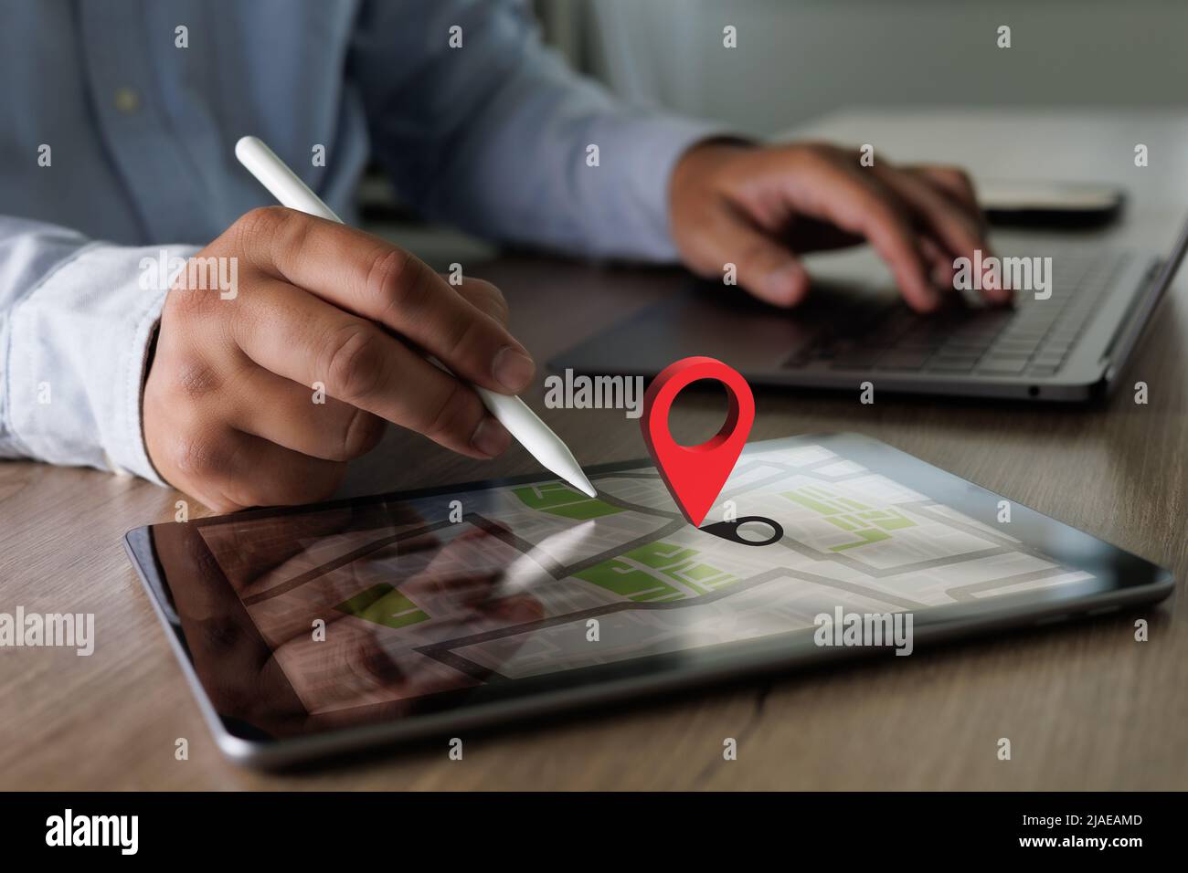 hand using a smartphone Holding GPS Map to Route Destination network ...