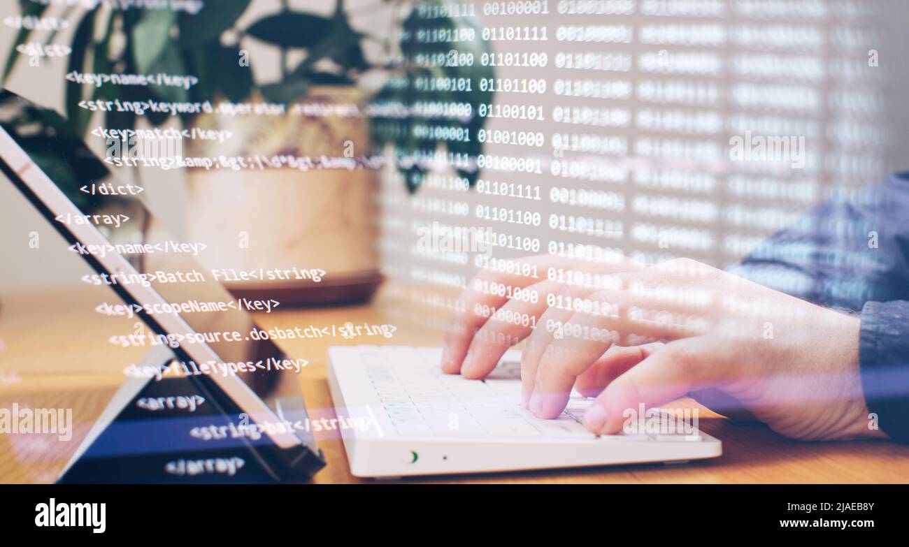 Businessman working with laptop computer on wooden desk in modern ...