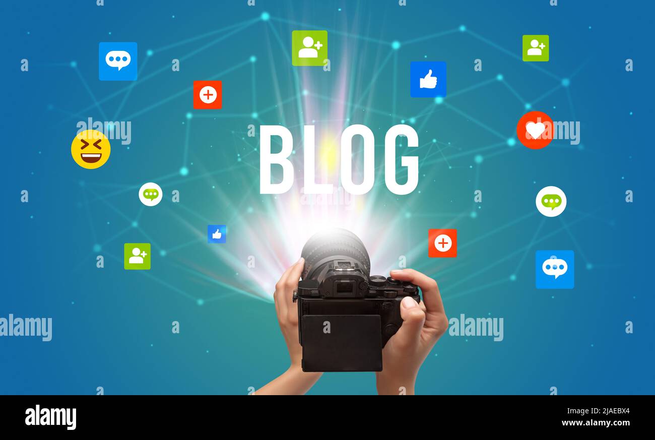 Using camera to capture social media content Stock Photo - Alamy