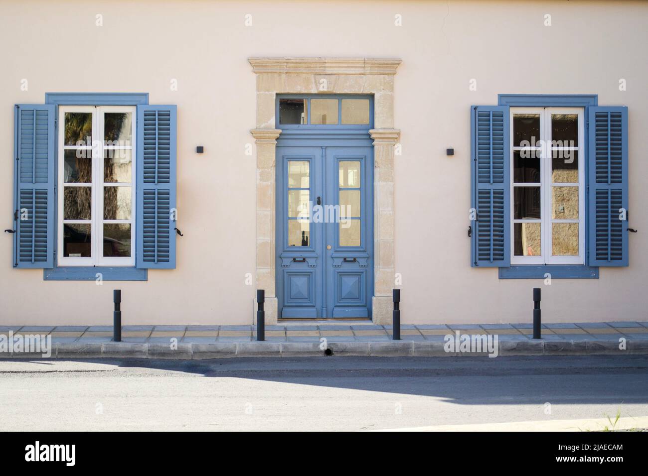 Beautiful blue door with windows in an old building in Cyprus Stock ...