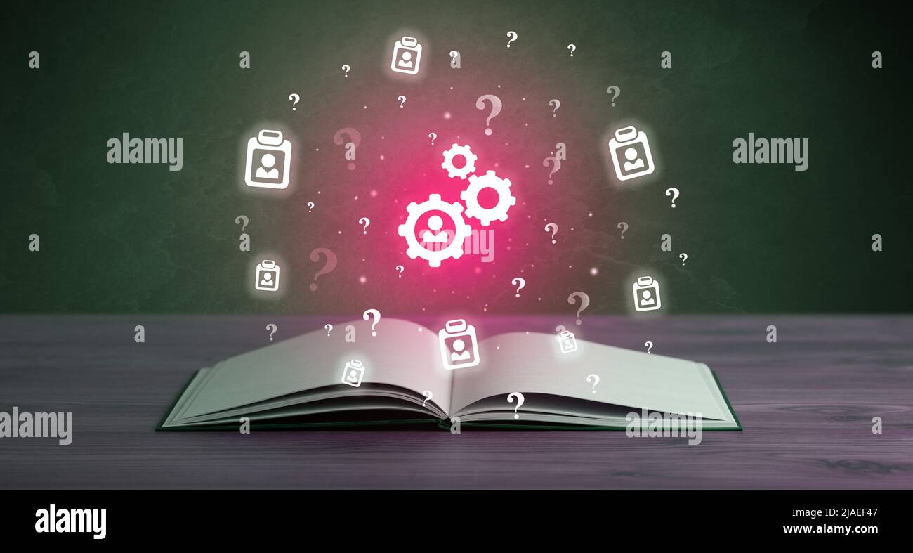 Open book with business icons above Stock Photo - Alamy