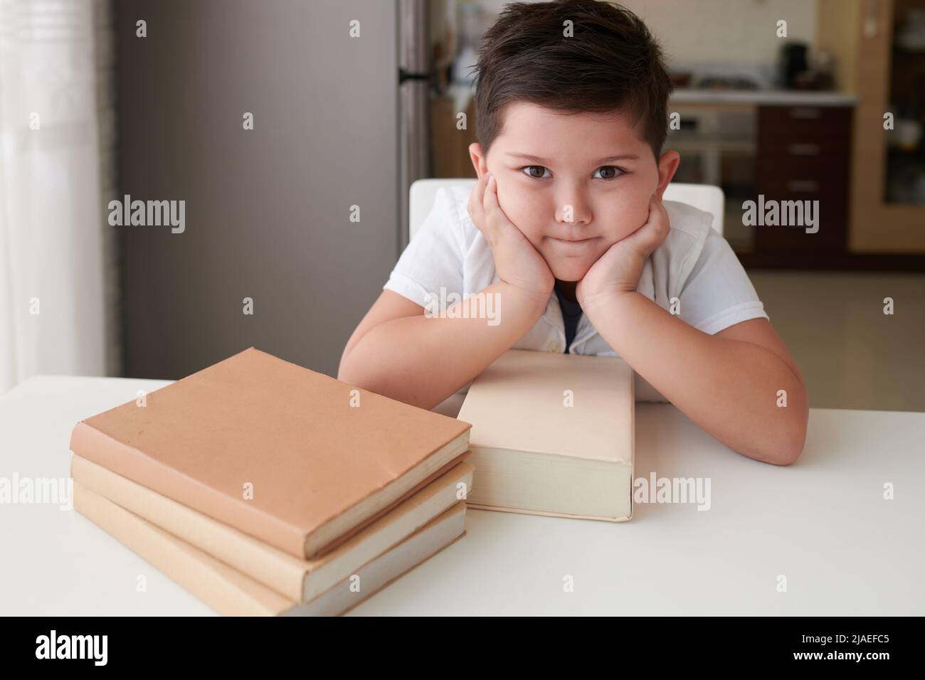 Determined child tablet hi-res stock photography and images - Alamy