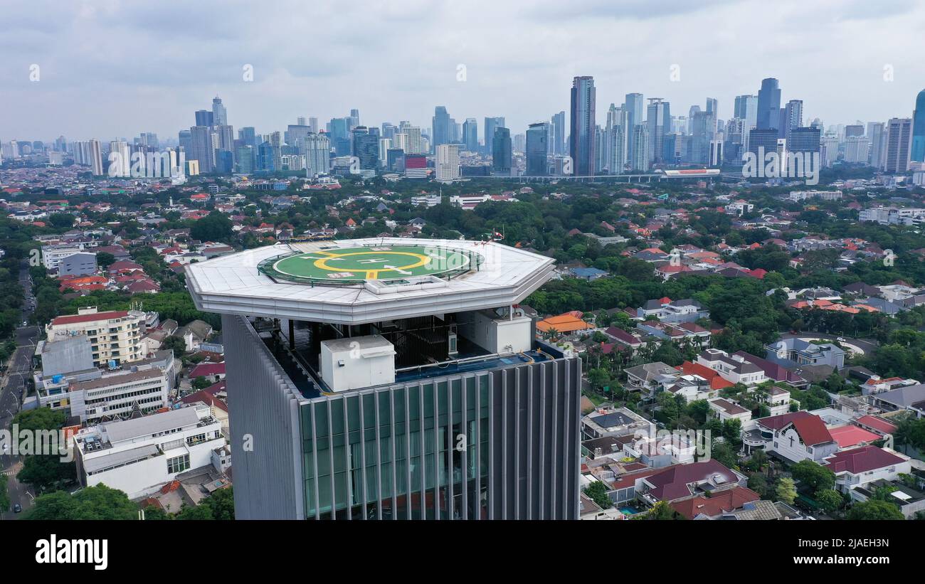 Aerial view of helipad. Helicopter landing pad on rooftop on skyscraper ...