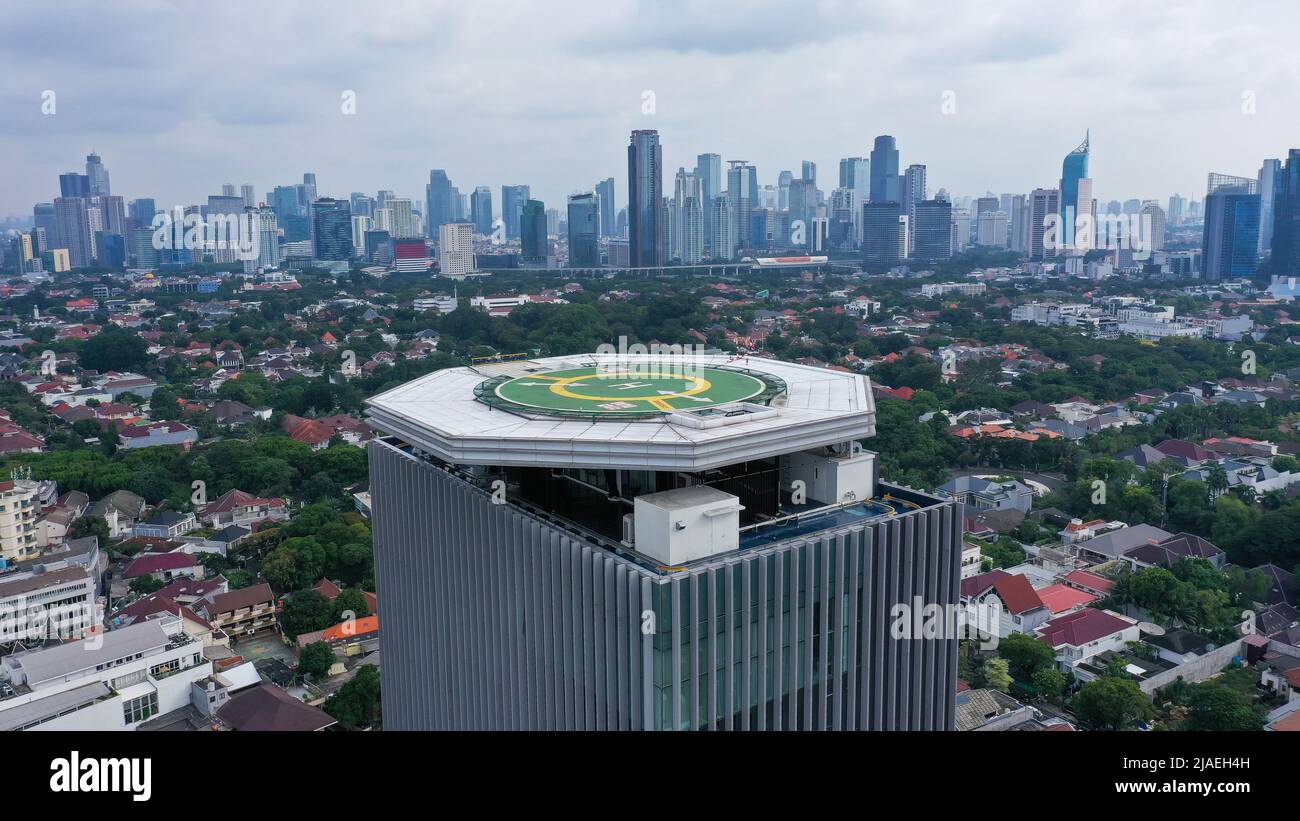 Aerial view of helipad. Helicopter landing pad on rooftop on skyscraper ...