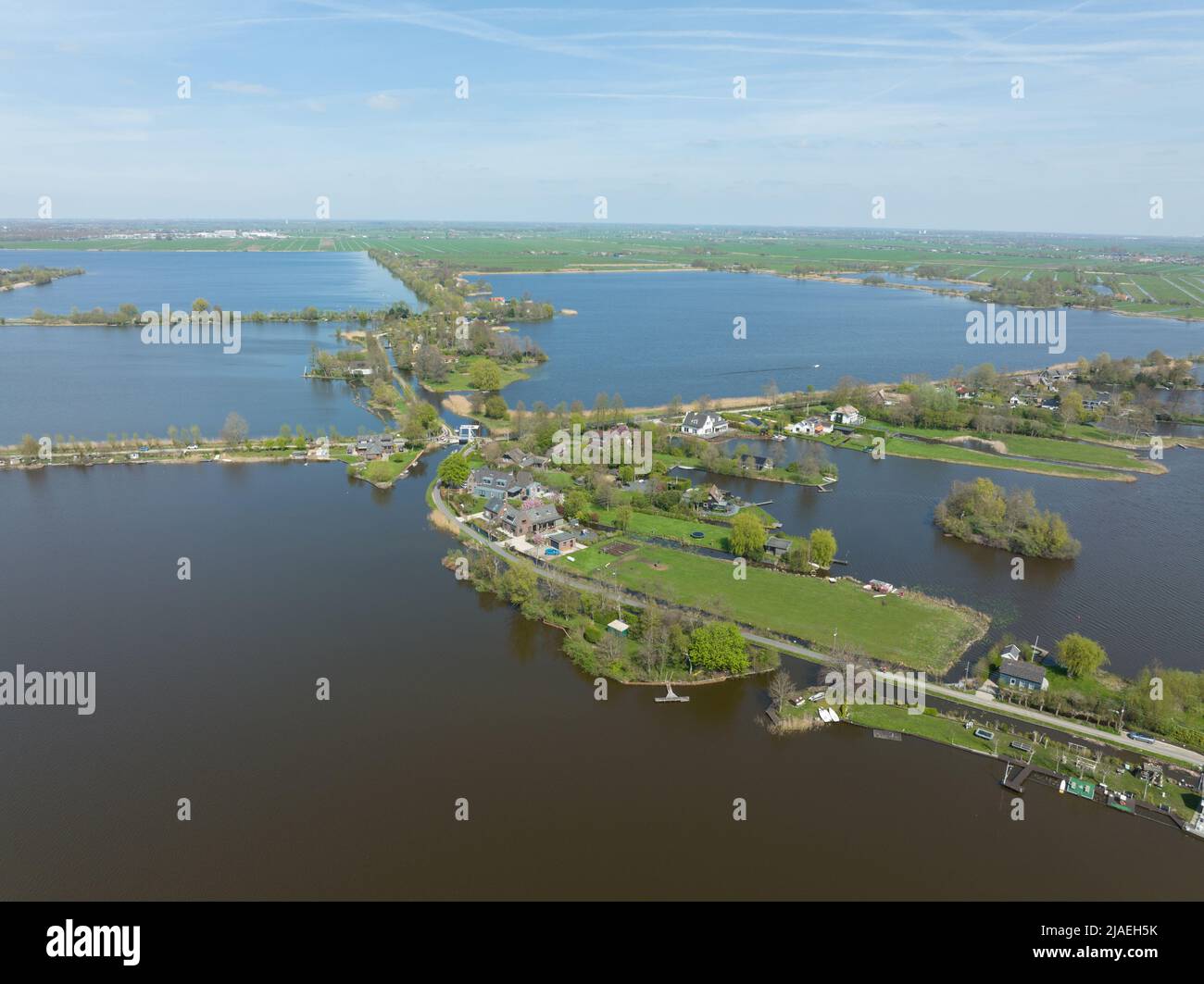 Typical dutch nature lake scenery at a sunny day. Reeuwijkse plannen in ...