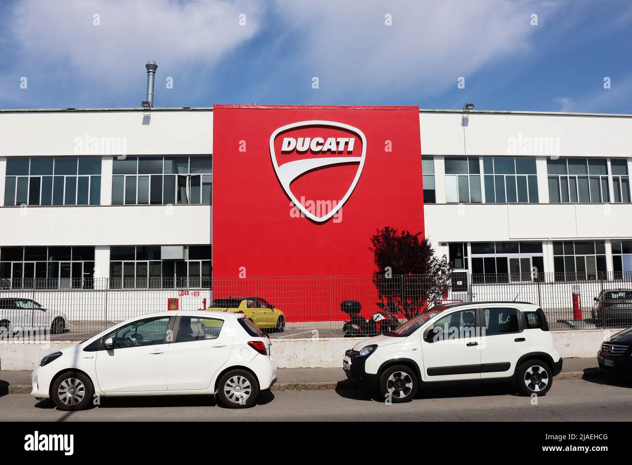Headquarters of Ducati with big logo on the wall. Ducati is a famous ...