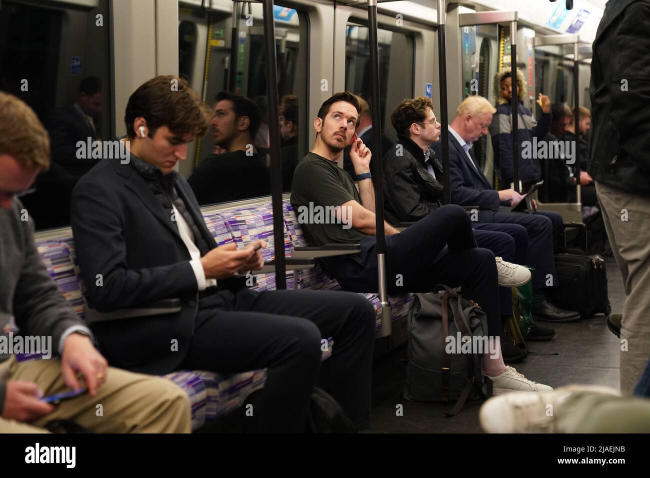 File photo dated 24/05/22 of passengers on board an Elizabeth Line ...