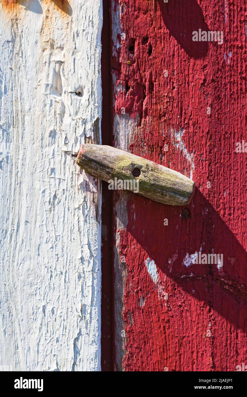 Closed door with a wooden handle Stock Photo - Alamy