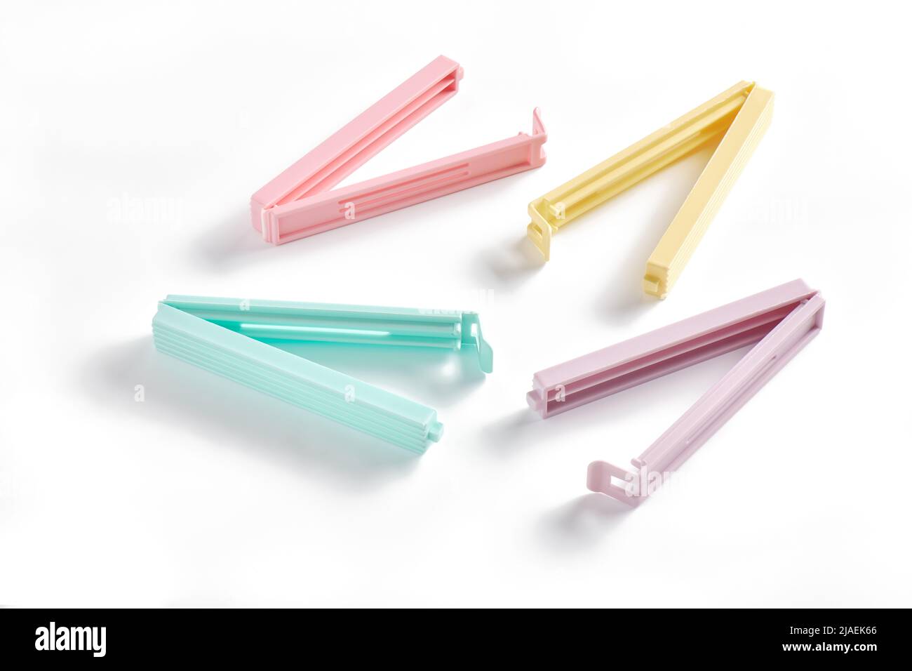 Plastic bag clips on a white background, photo stacking Stock Photo - Alamy