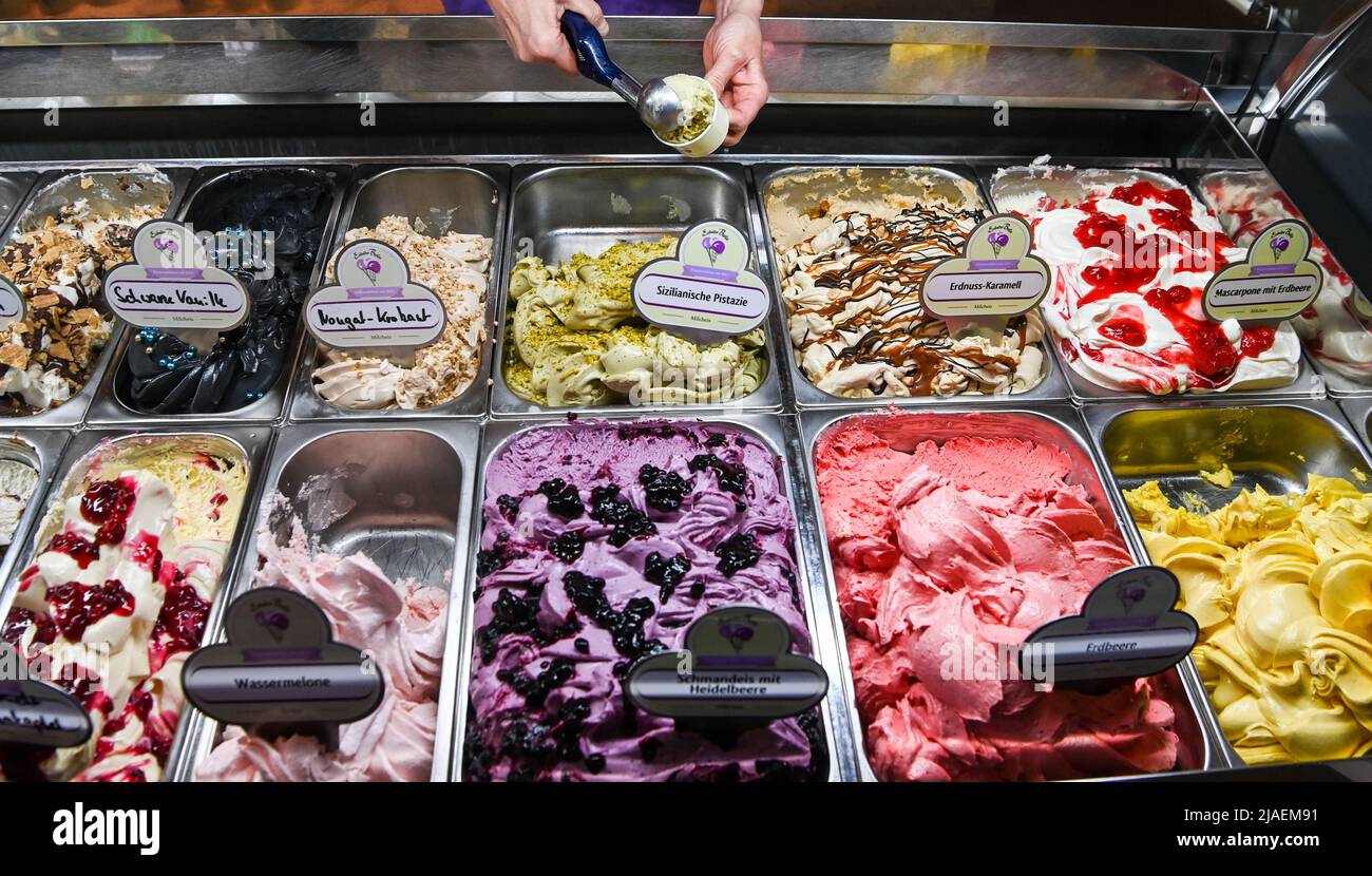 Berlin, Germany. 24th May, 2022. A scoop of pistachio ice cream is ...