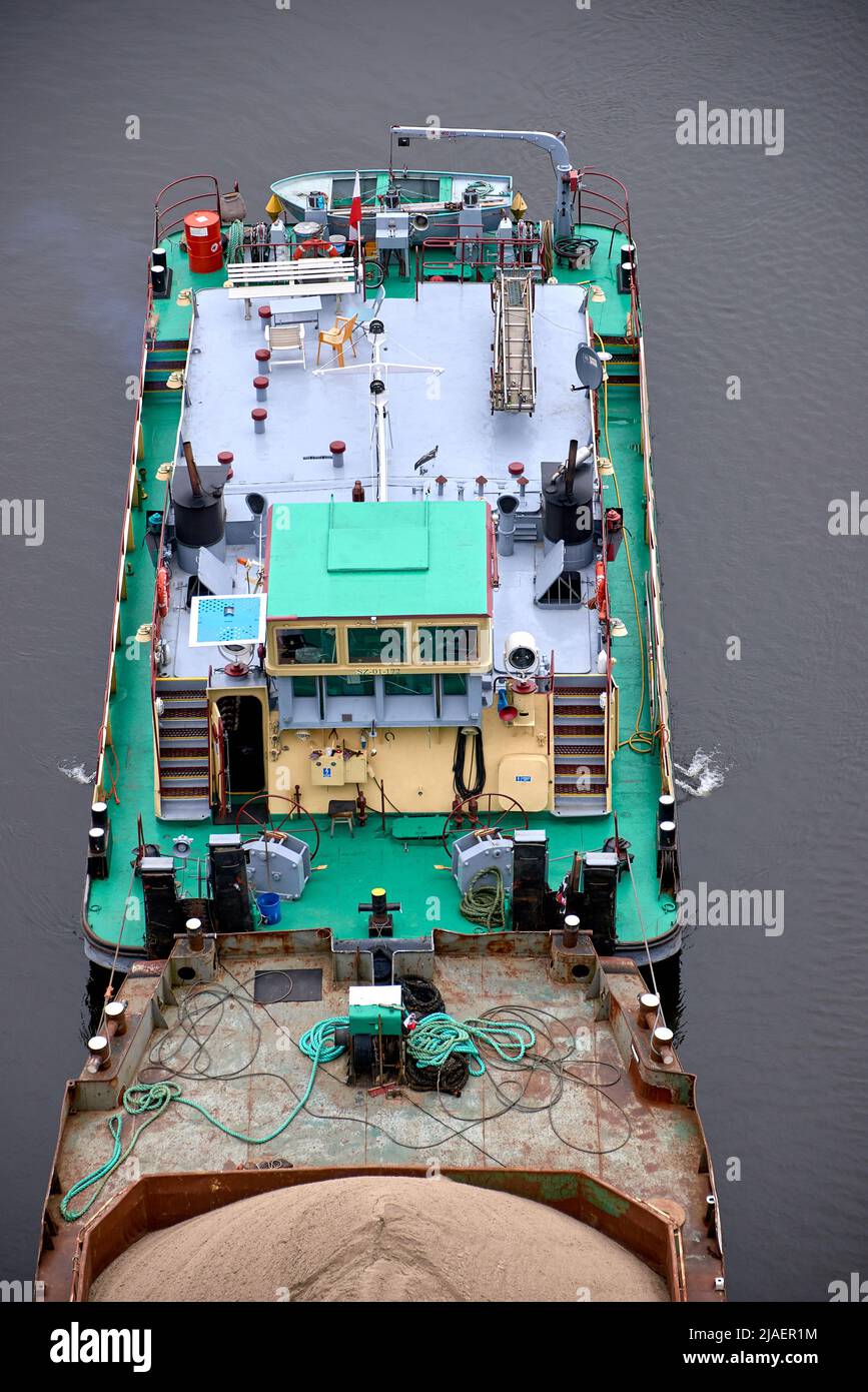 vessel transporting gravel sand on a river Stock Photo - Alamy
