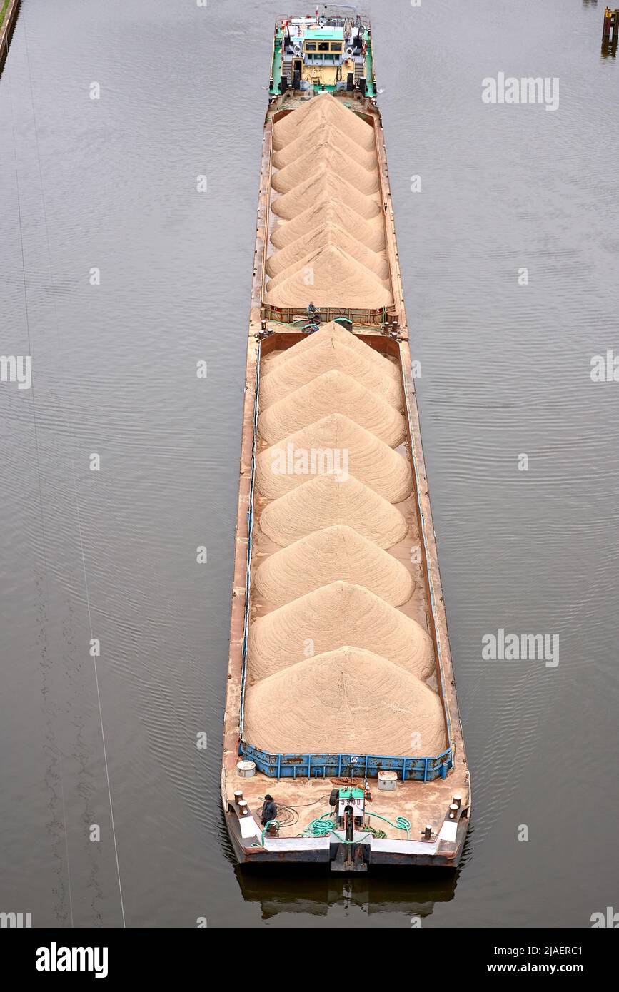 vessel transporting gravel sand on a river Stock Photo - Alamy