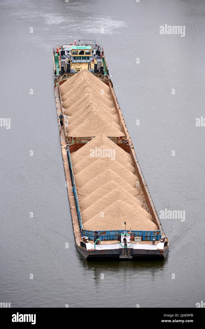 vessel transporting gravel sand on a river Stock Photo - Alamy