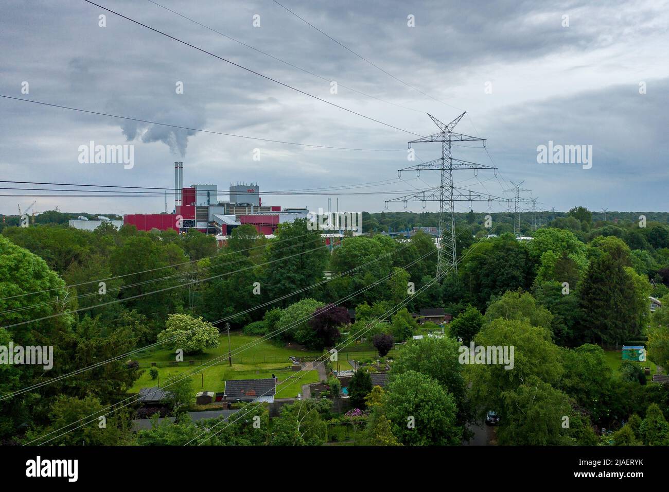Bremen, Germany. 30th May, 2022. A high-voltage line runs in front of ...