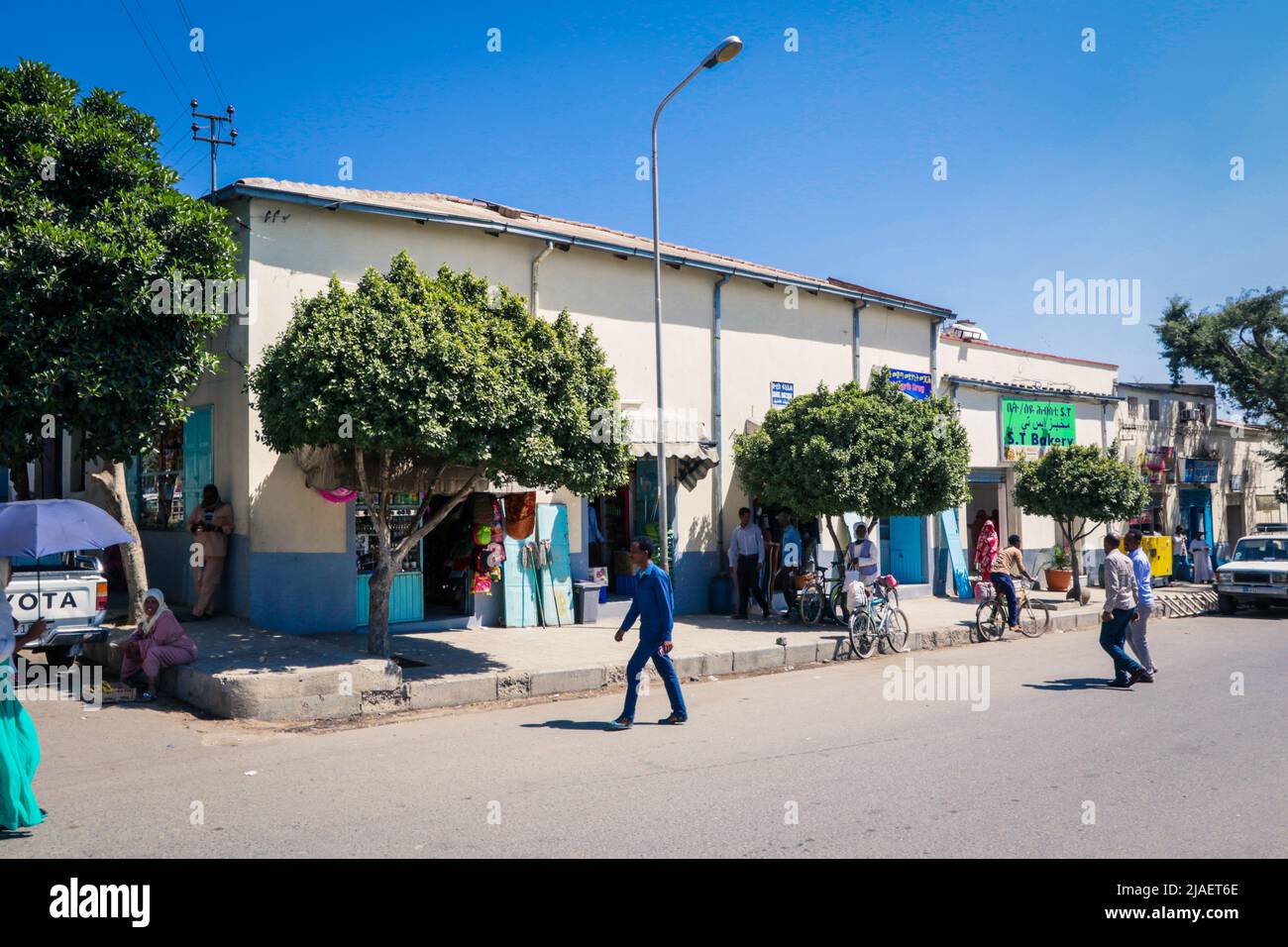 Local Eritrean People walking near the Fruit and Vegetable Keren Market ...
