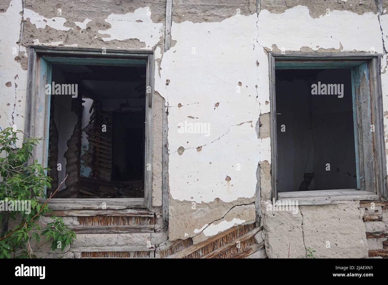 Abandoned house with empty windows Stock Photo - Alamy