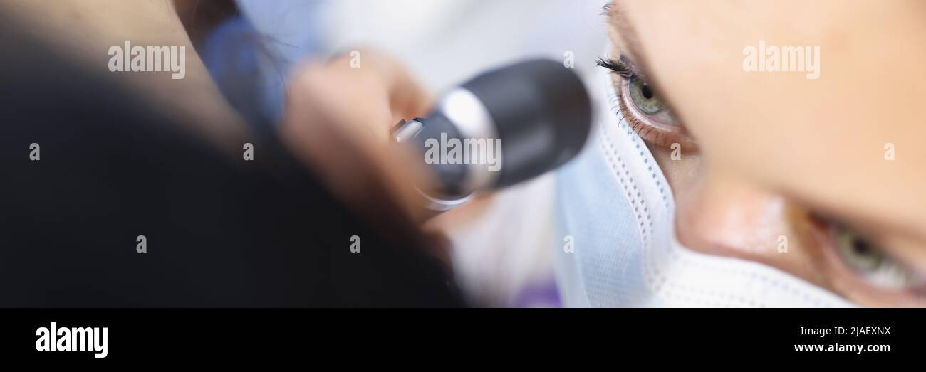 Woman ear infection doctor hi-res stock photography and images - Alamy