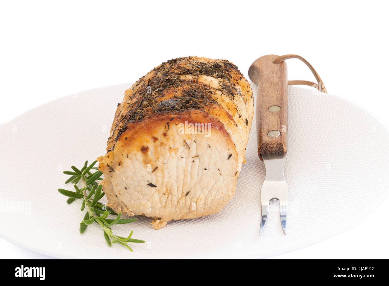 roast pork cooked on a white background Stock Photo - Alamy
