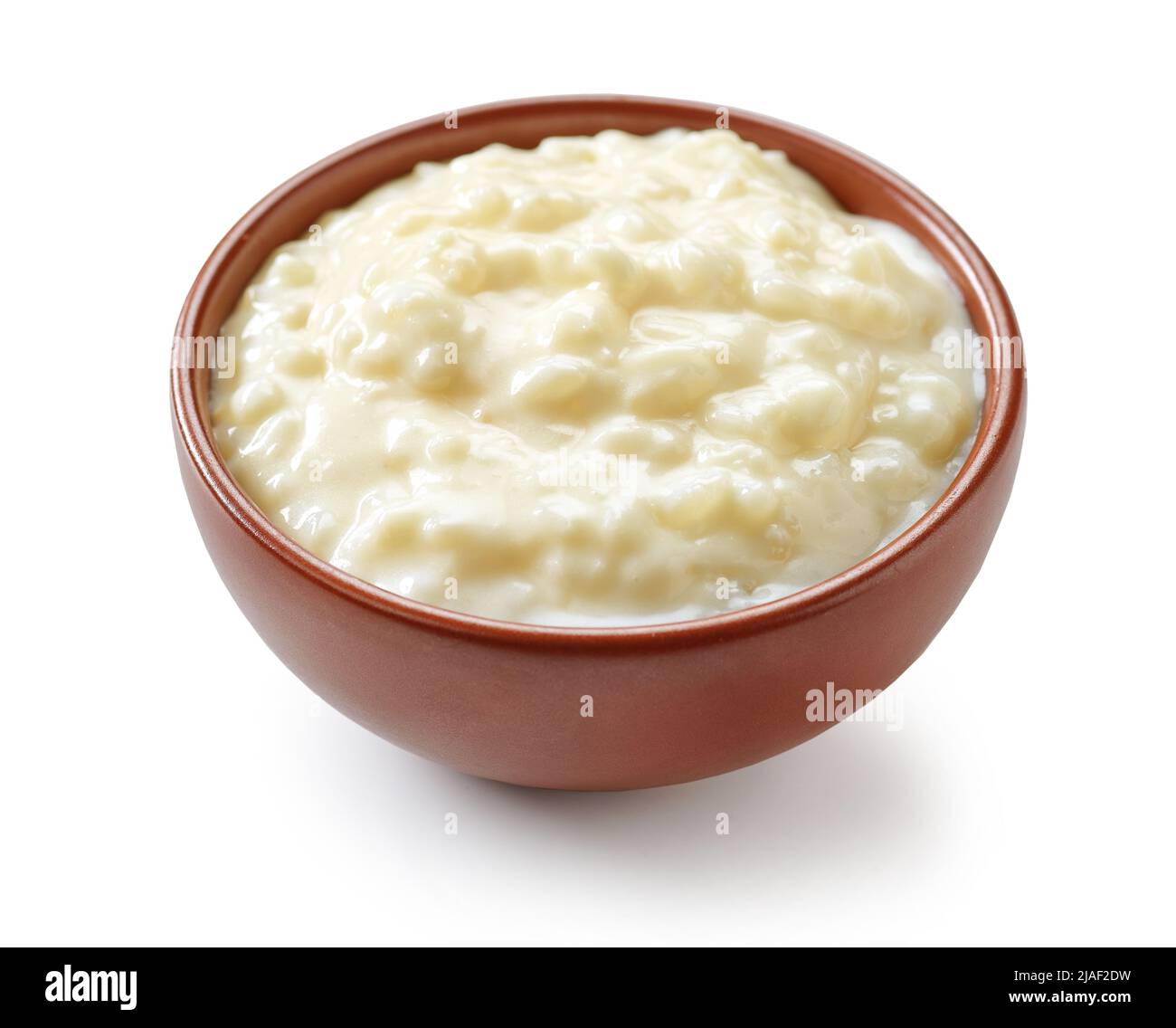 bowl of rice pudding isolated on white background Stock Photo - Alamy