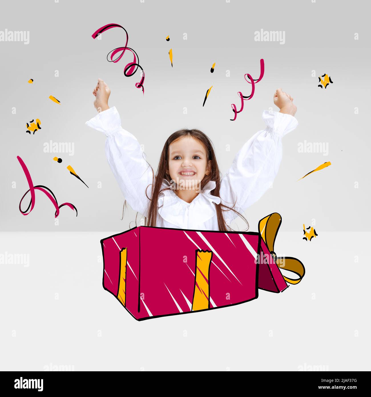 Happy kid, little smiling girl stick out from big gift box isolated on ...