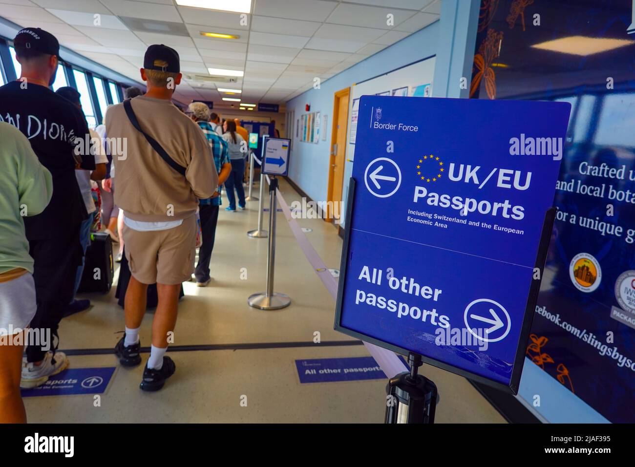 Signs and queues at the UK border at Leeds Bradfort Airport, Yorkshire ...
