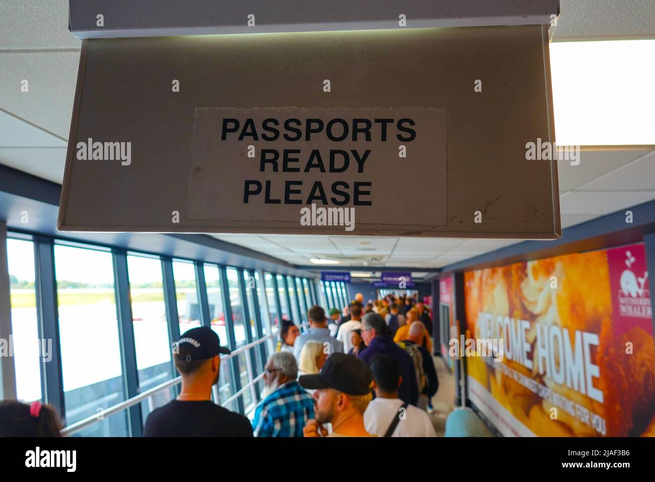 Signs and queues at the UK border at Leeds Bradfort Airport, Yorkshire ...