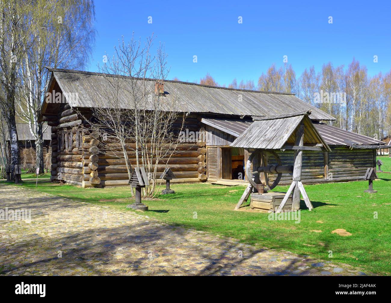 A wooden hut with a well. Preserved monuments of traditional wooden ...