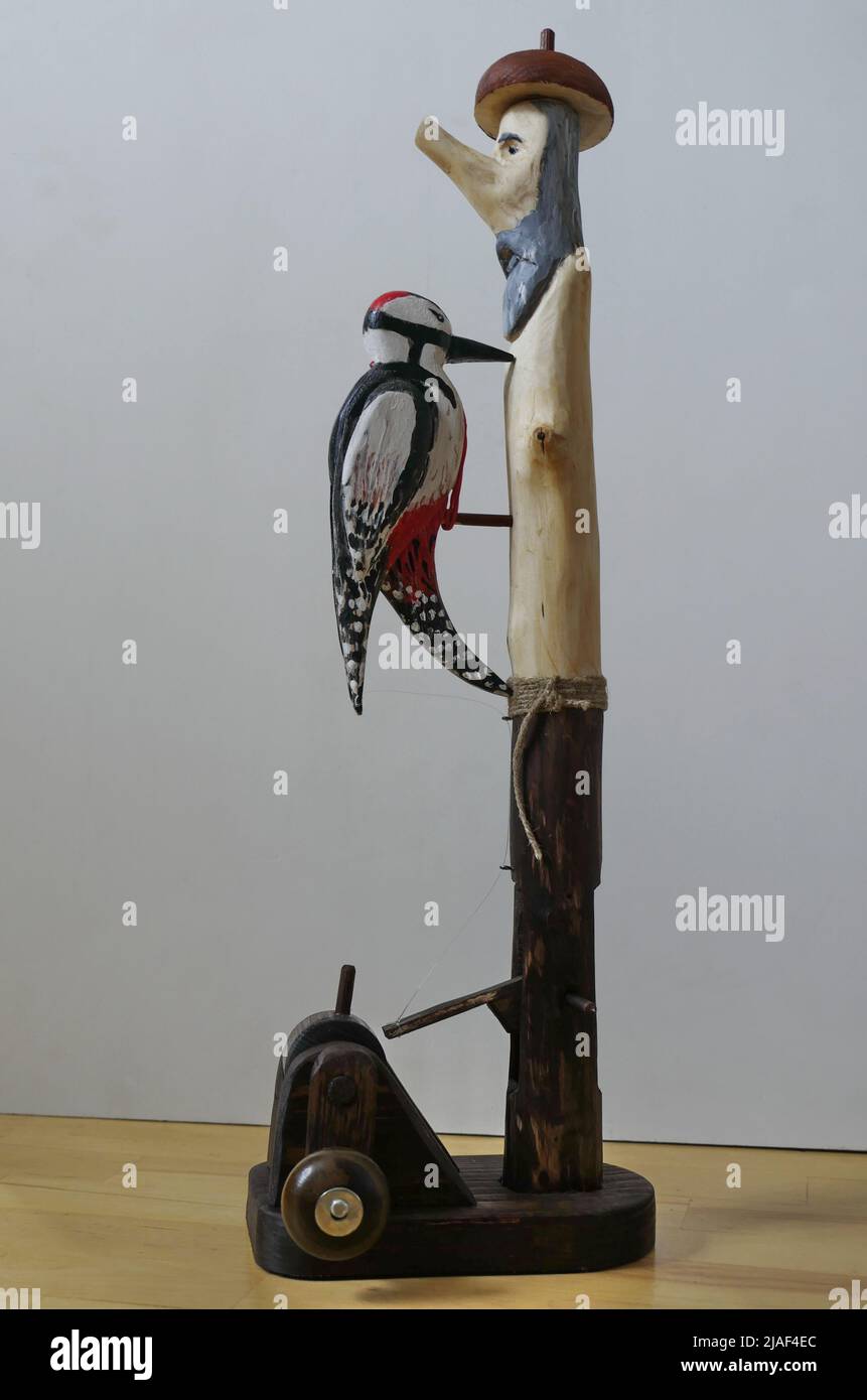 Automaton bird woodpecker demonstration in workshop Stock Photo - Alamy
