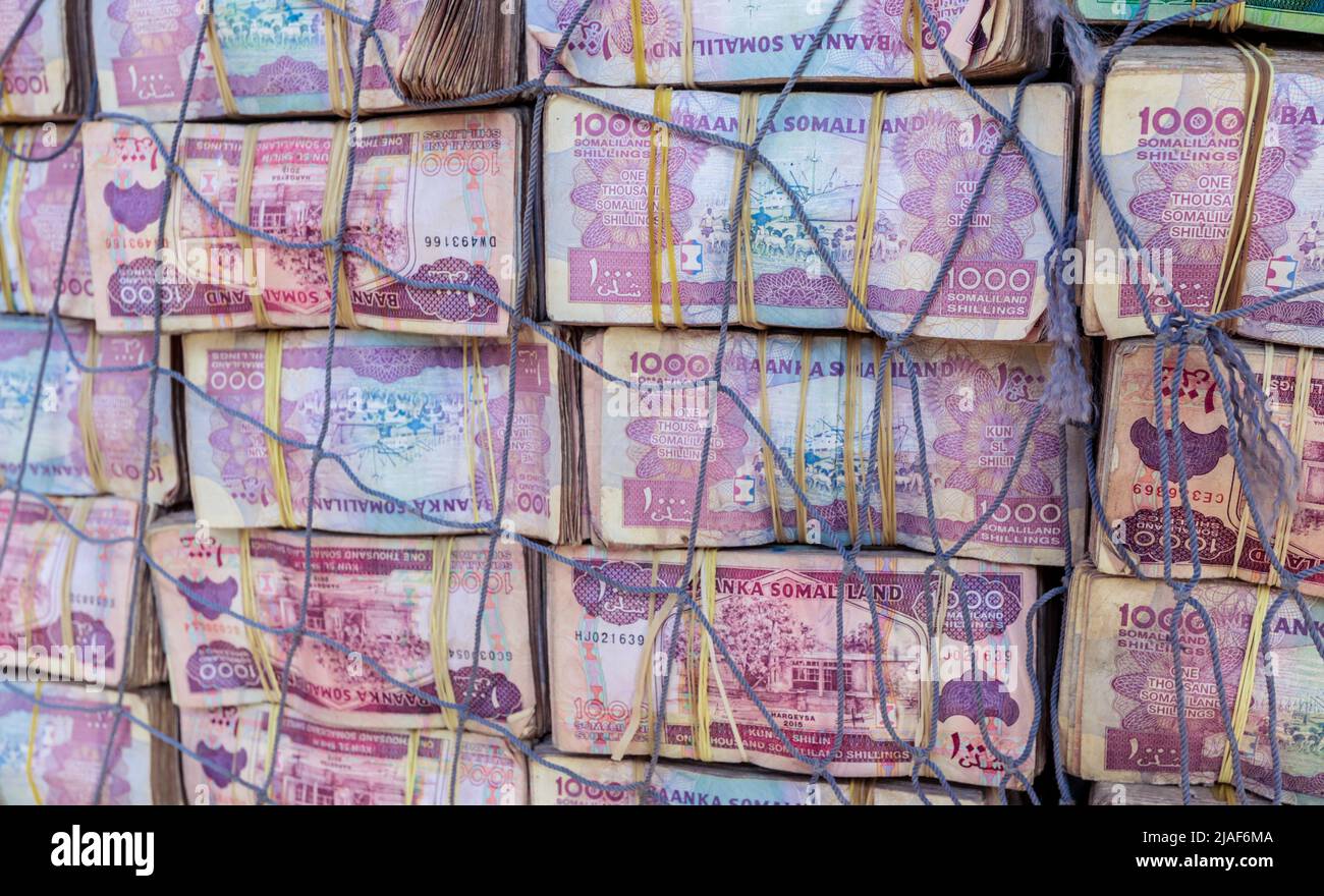 Boxes of Colorful Money selling on the Street Stock Photo - Alamy