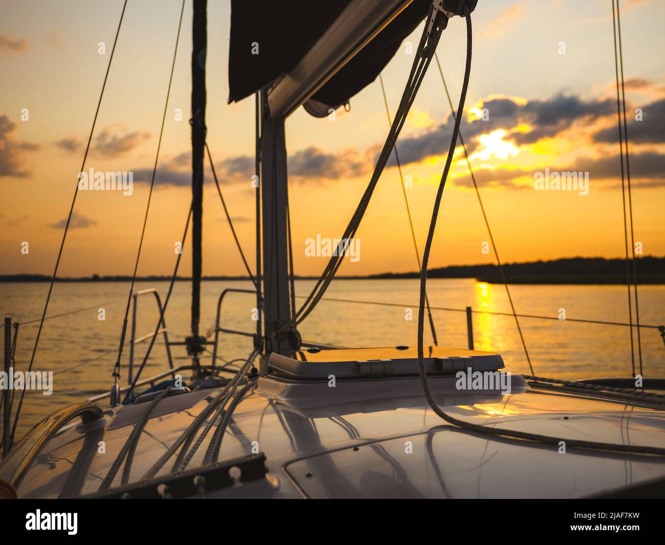 Sailboat golden hour sailing on hi-res stock photography and images - Alamy