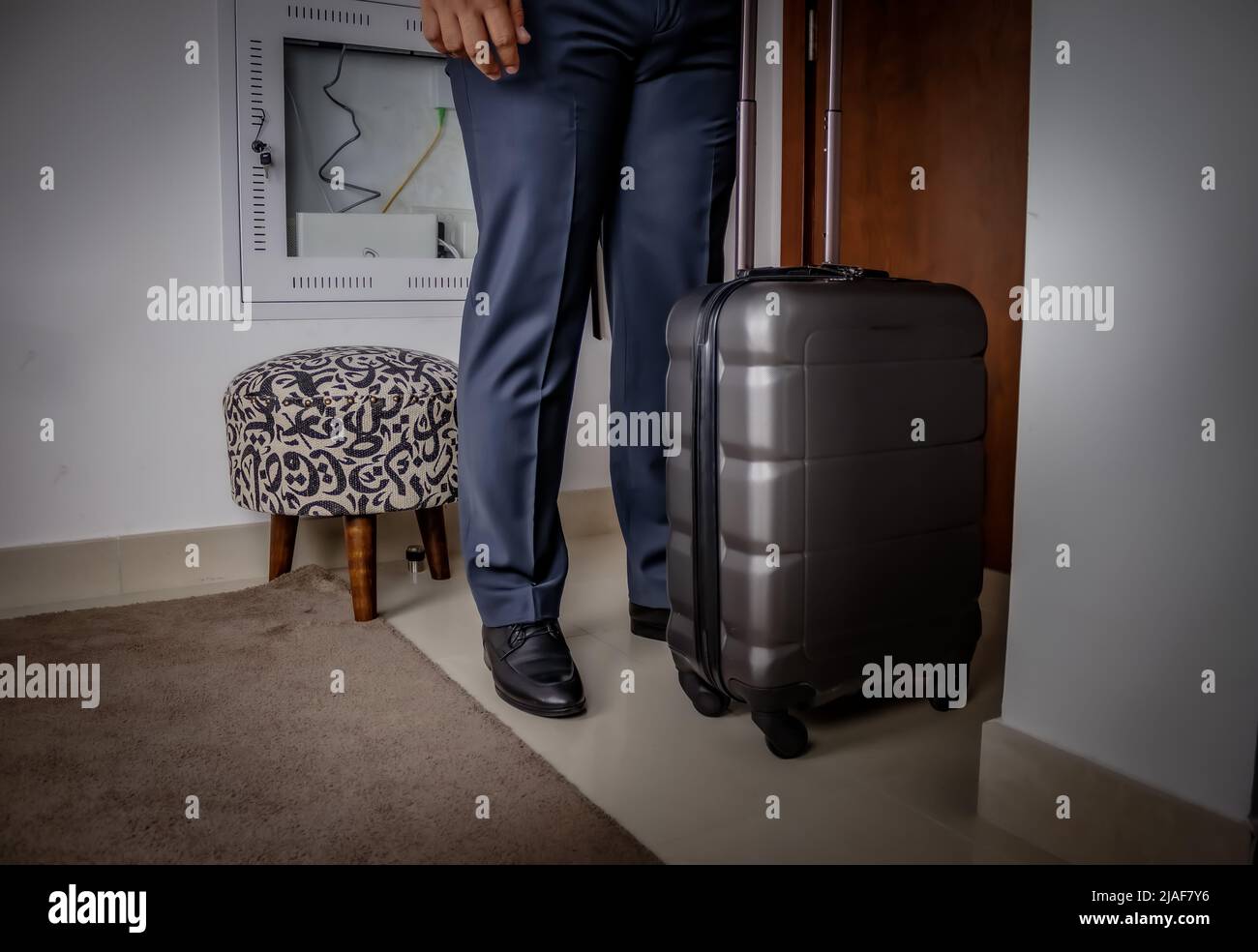 rear view of an unrecognizable businessman about to leave the house ...