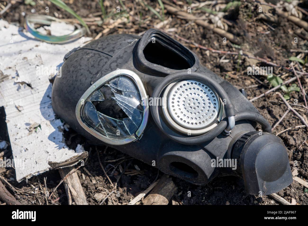 War Ukraine. Broken gas mask of Russian terrorists. Killed soldier in ...