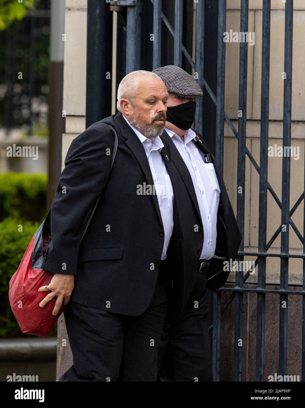 Former Grenadier Guardsman David Holden (in mask) arrives at Laganside ...