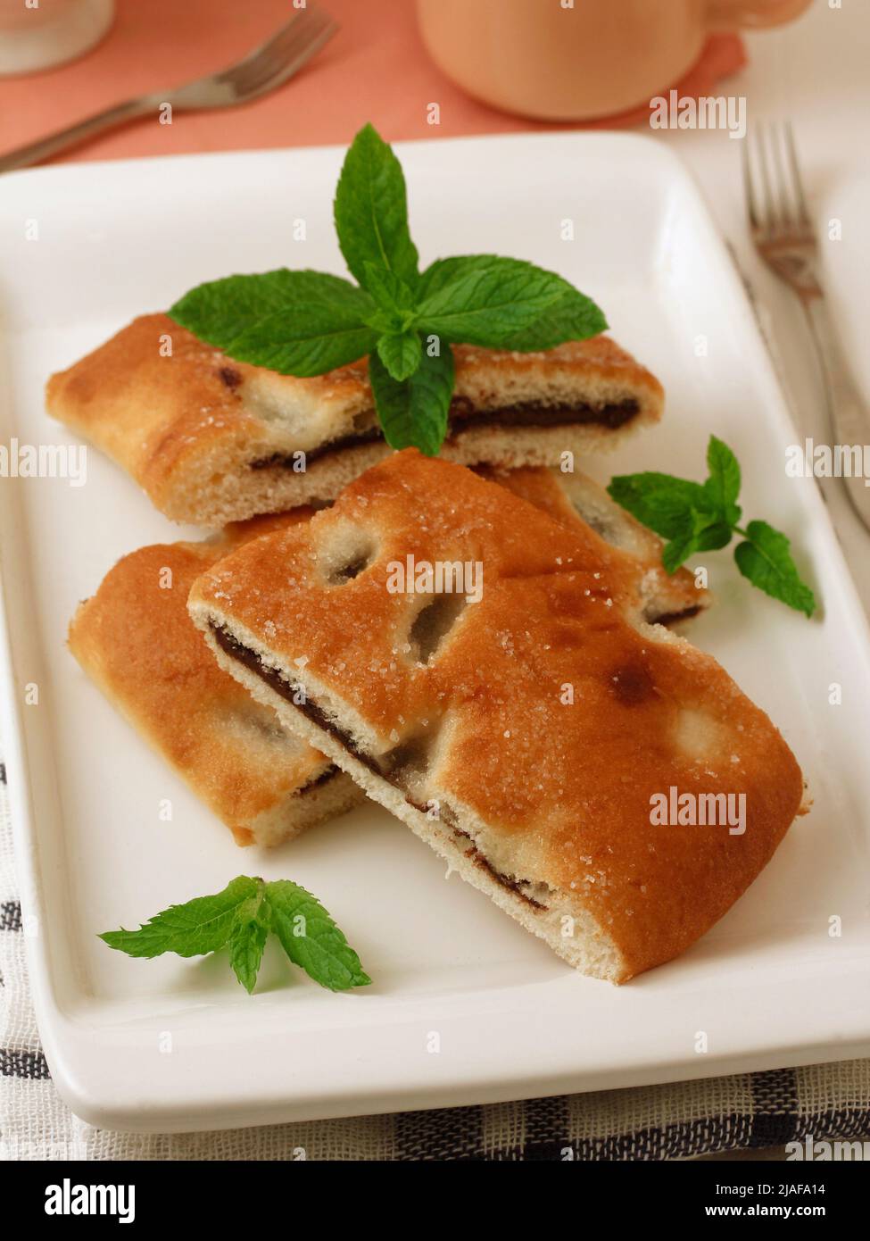 Coca de chocolate. Pastry with chocolate. Typical from Catalonia, Spain ...