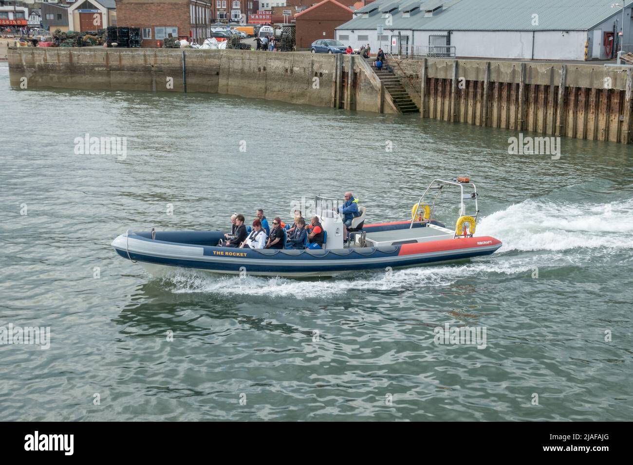 'The Rocket' tourist speedboat heading to sea, one of many tourist ...