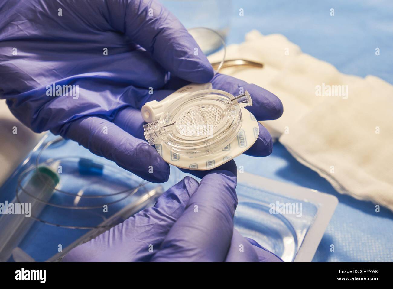 Flat epidural filter Balton in the hands of a doctor Stock Photo - Alamy