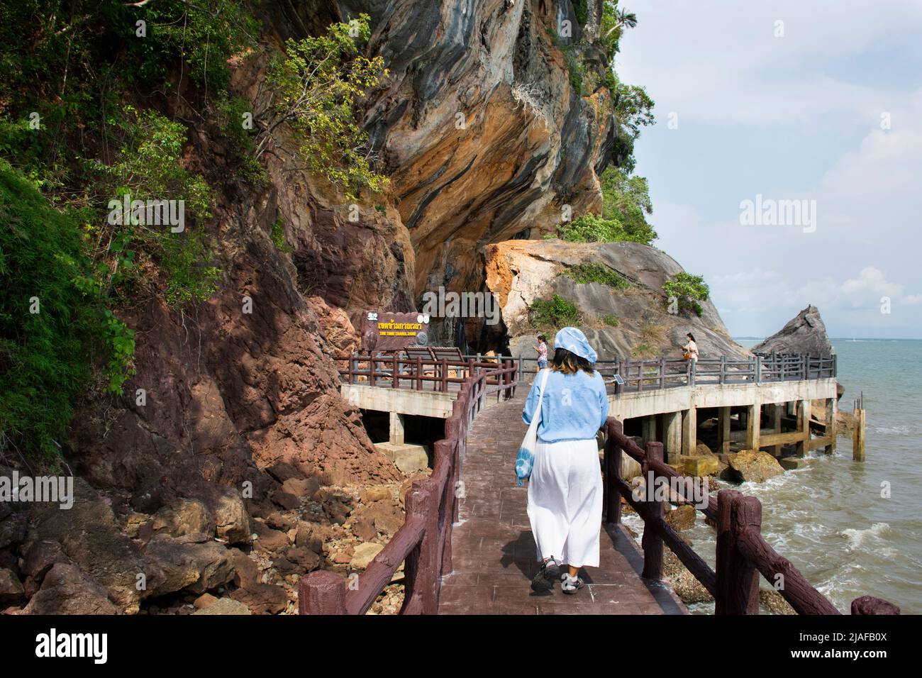 Travelers thai women people travel visit and walking on stone bridge of ...