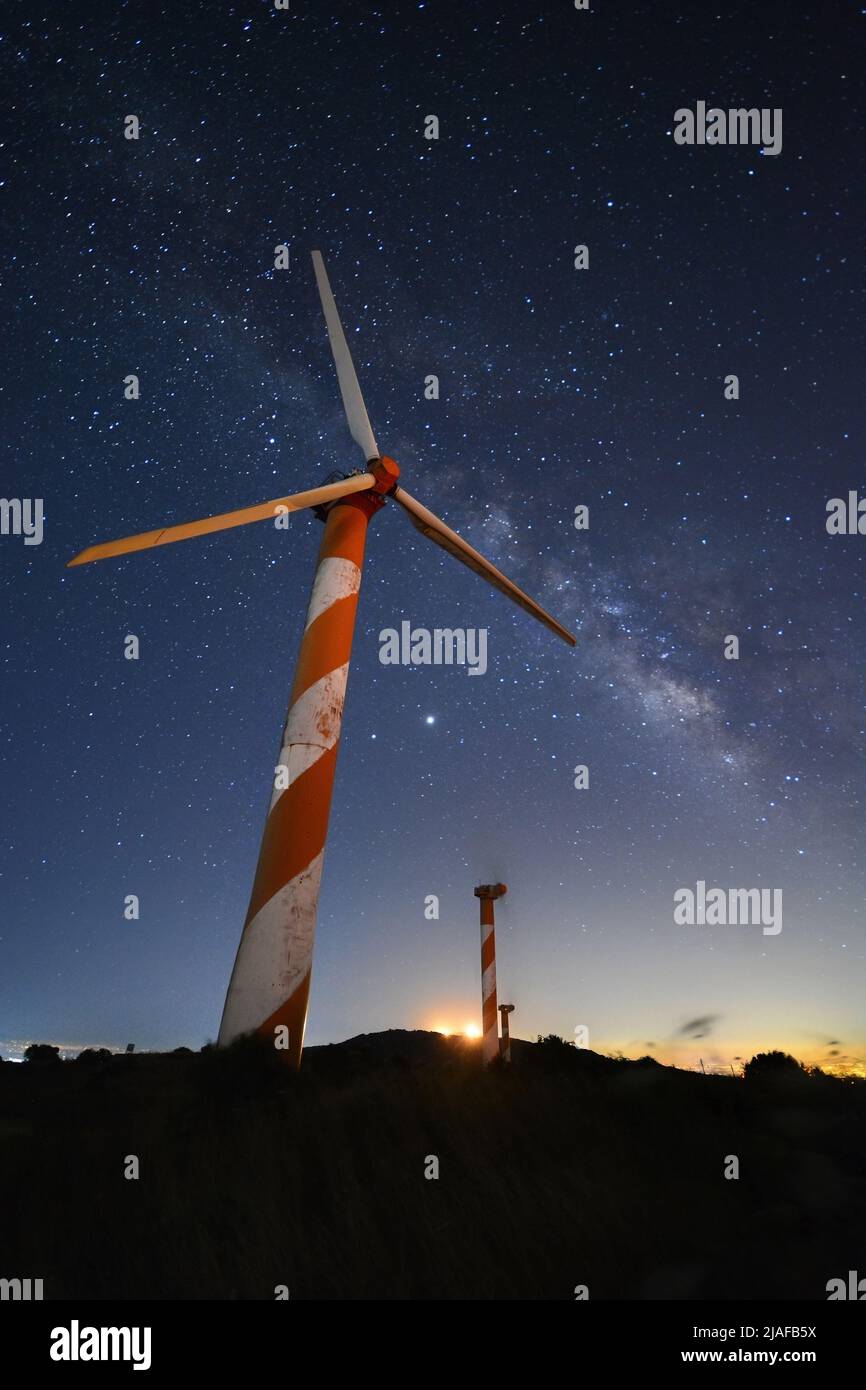Wind turbine and the night sky Stock Photo - Alamy