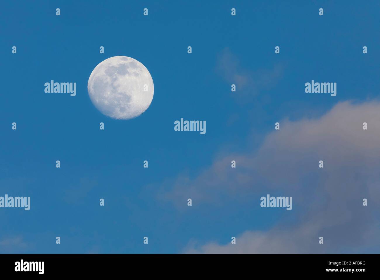 full moon and clouds at dusk, Switzerland Stock Photo - Alamy