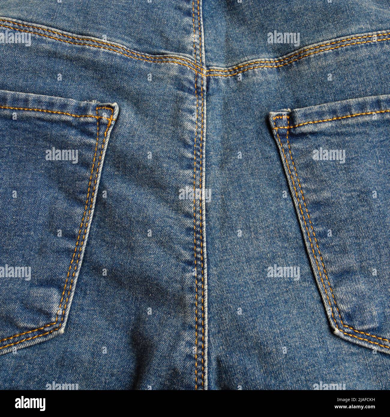 Close up detail of back pocket of light blue jeans denim Stock Photo ...