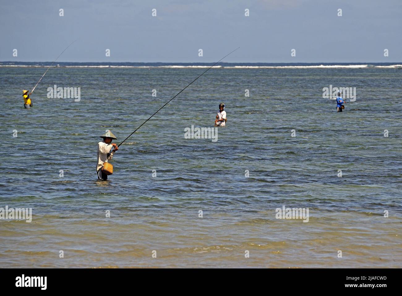 Angler on the beach of Sanur, Indonesia, Bali Stock Photo - Alamy