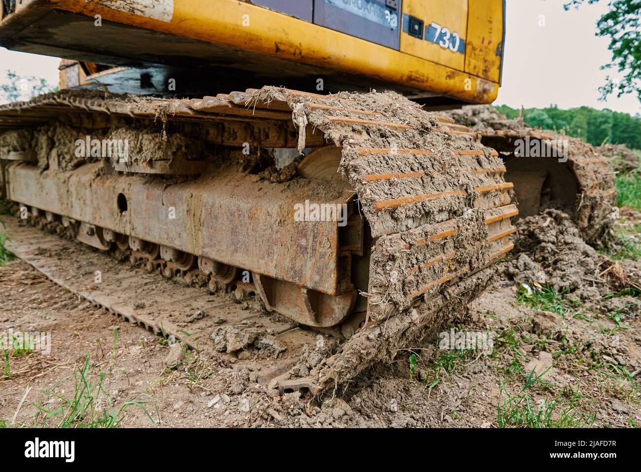 Yellow excavator on construction site, Heavy construction machine ...