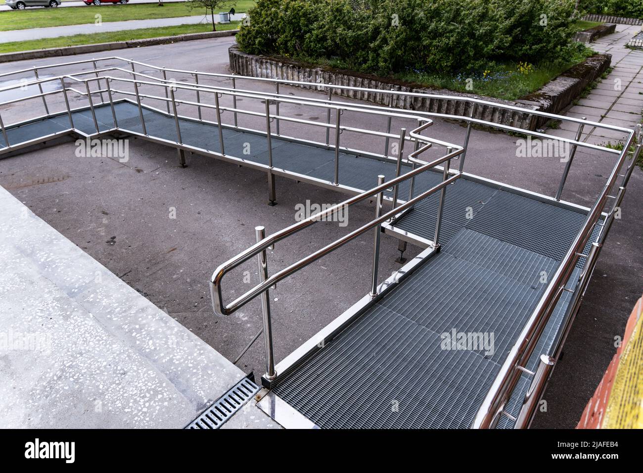 A ramp for people with disabilities near a public building Stock Photo ...