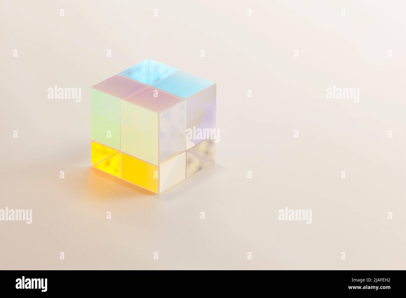 prism in the form of a cube on a light background Stock Photo - Alamy