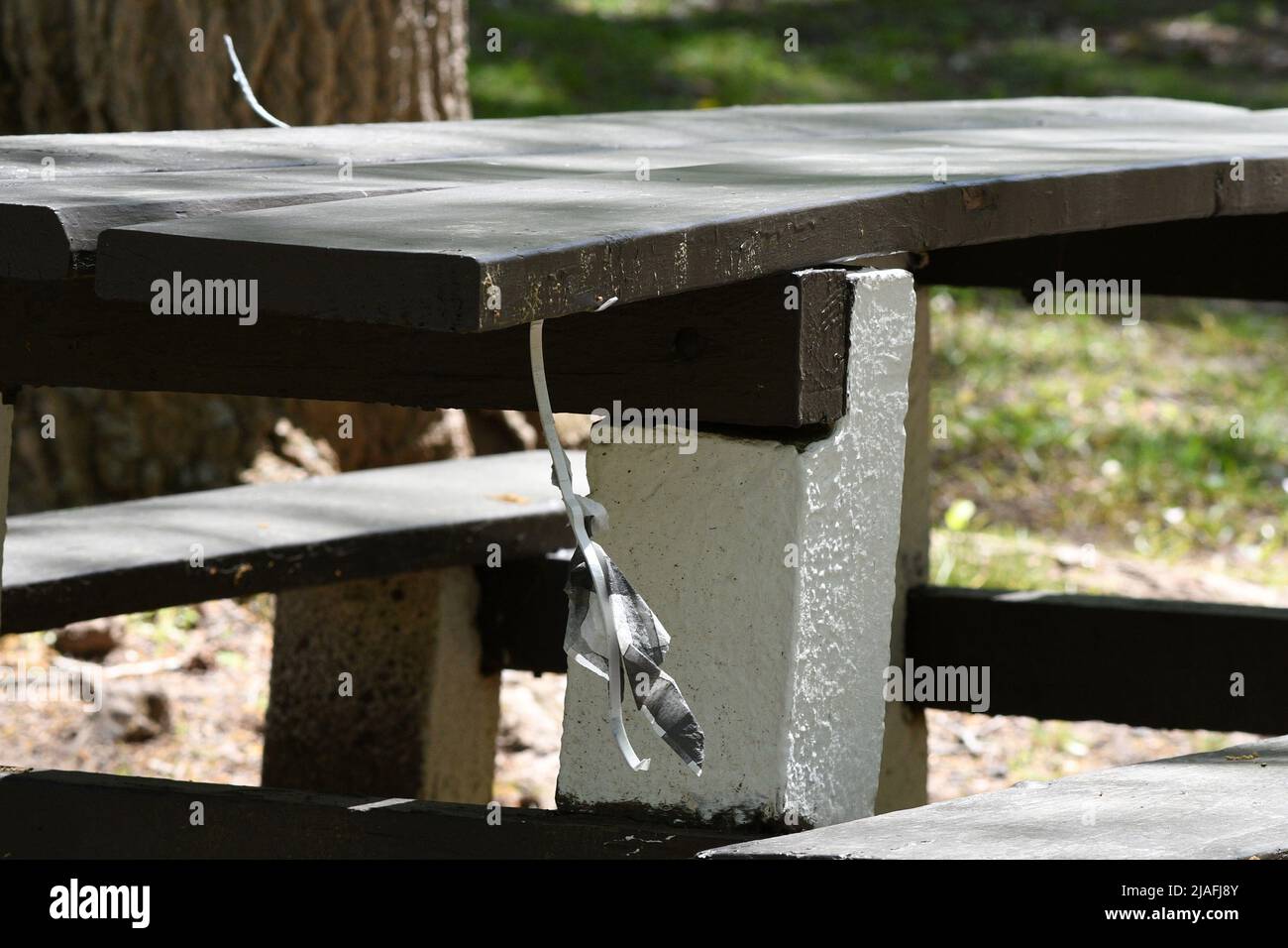 HANGMAN: A character created out of paper dangles by the neck from a ...