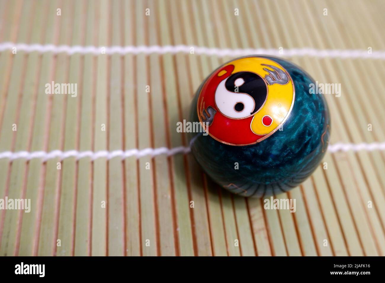 Ball with yin yang sign Stock Photo - Alamy