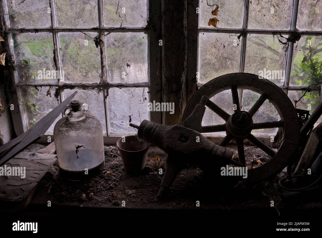 INTERIOR OF STORAGE ROOM WITH OLD FURNITURE AND SIGNS AT A FARM BY ...