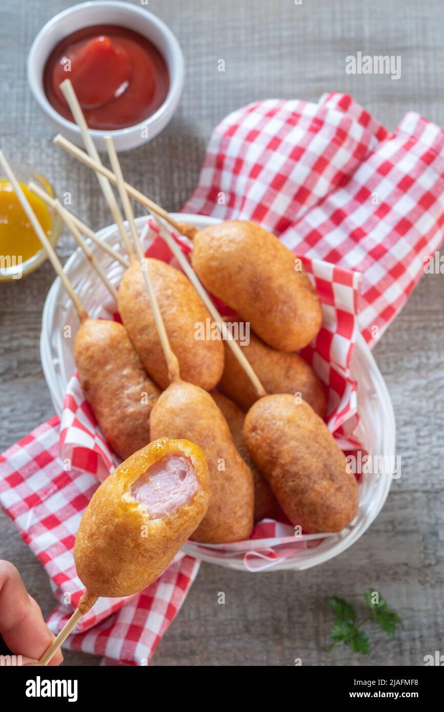 Traditional American street food corn dogs Stock Photo - Alamy