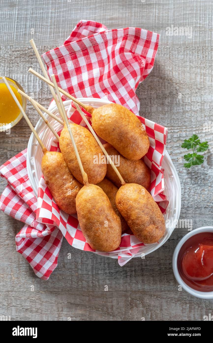 Traditional American street food corn dogs Stock Photo - Alamy