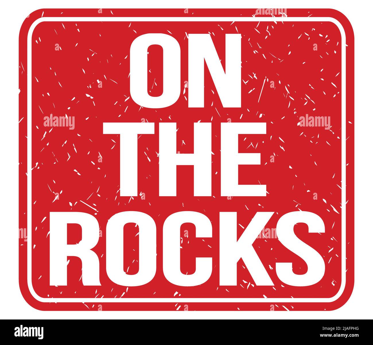 ON THE ROCKS, text written on red vintage stamp sign Stock Photo - Alamy